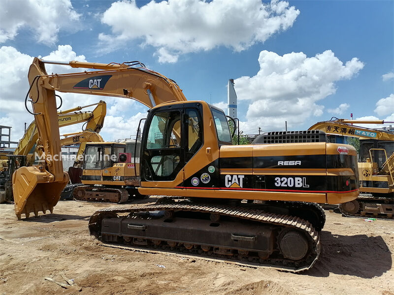 Caterpillar 330BL bager guseničar