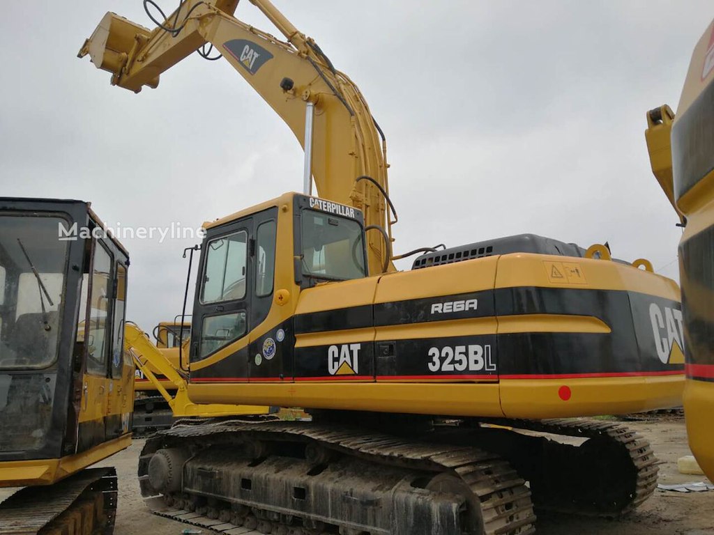 Caterpillar 325BL bager guseničar