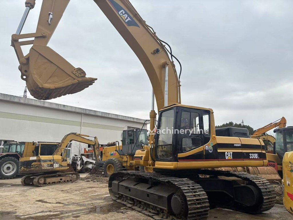 Caterpillar 330BL bager guseničar