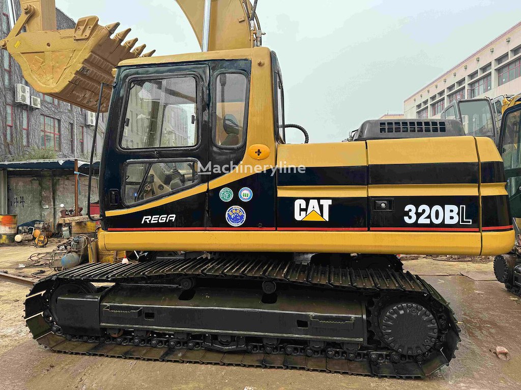 Caterpillar 320BL bager guseničar