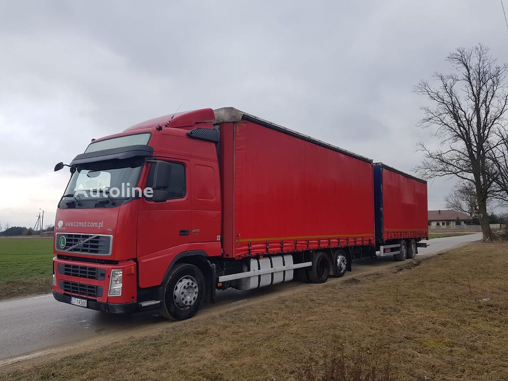 Volvo FH 12 kamion sa klizna zavesa cerada + prikolica sa kliznom ceradom