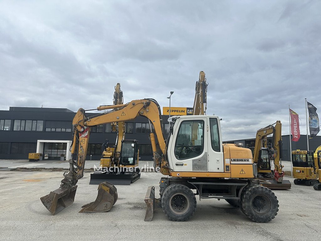 Liebherr A309 bager točkaš