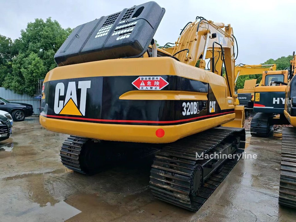 Caterpillar 320BL bager guseničar