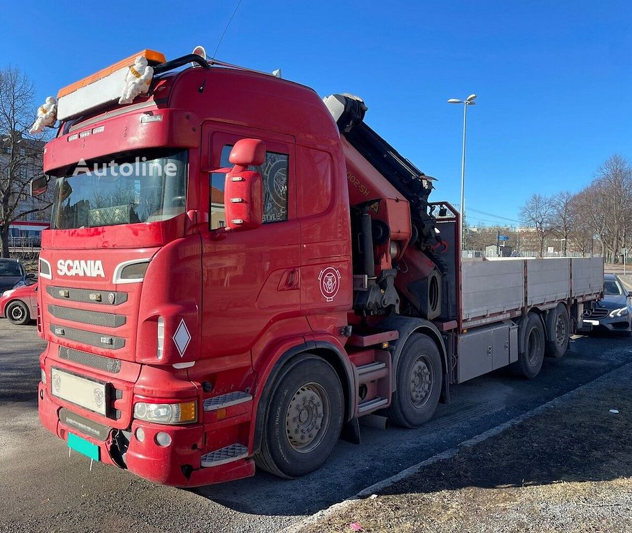 Scania 560 kamion s ravnom platformom