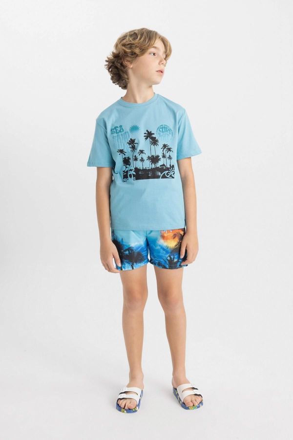 DEFACTO BOY'S PALM TREE PATTERNED SWIM SHORTS