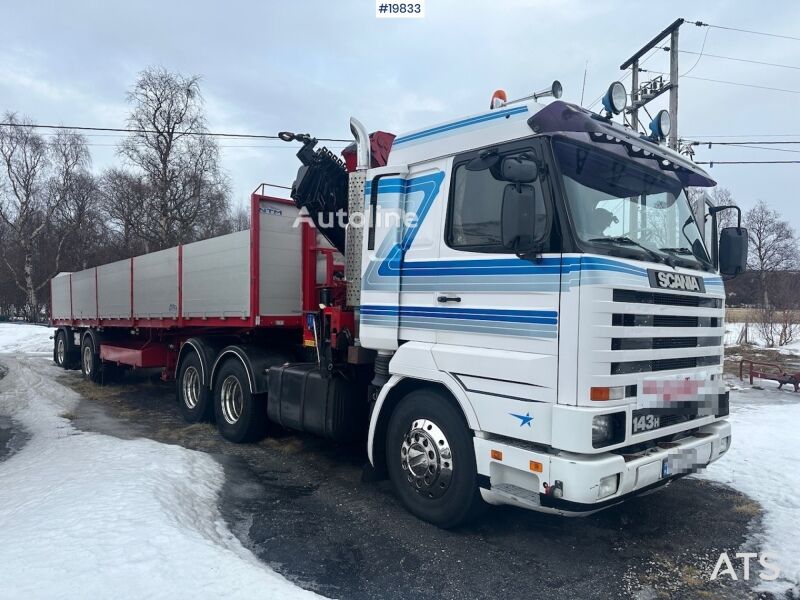 Scania R143H tegljač + poluprikolica sa ravnom platformom