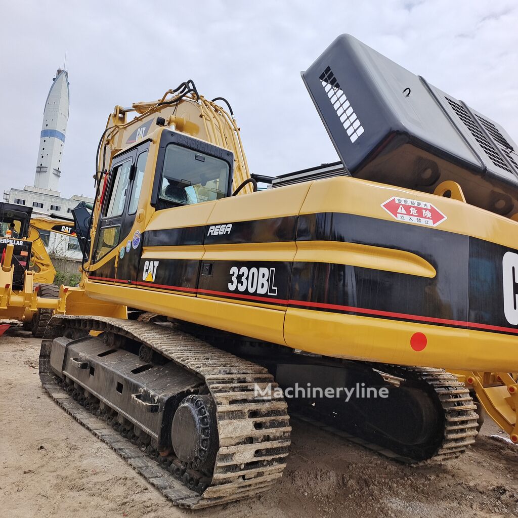 Caterpillar 330BL bager guseničar