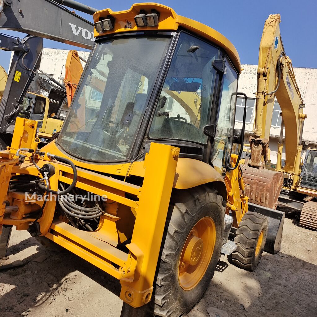 JCB 3CX bager guseničar