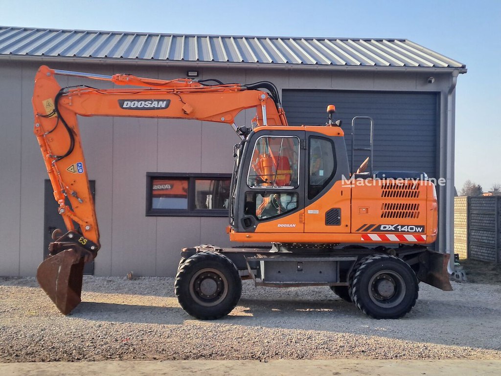 Doosan DX 140W-3 bager točkaš