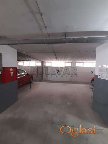 Izdaje se garažno mesto u podzemnoj garaži, 18m2