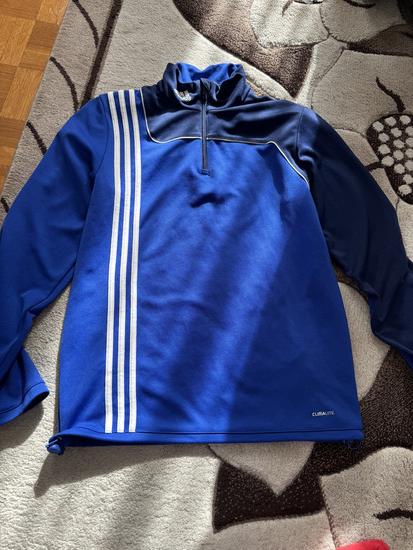 Adidas duks u L vel.