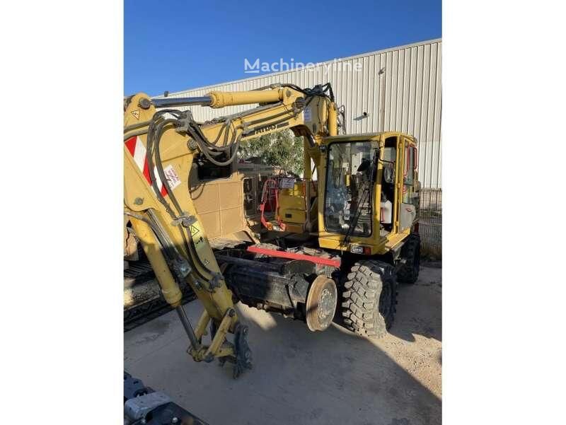 Atlas 1404 ZW bager na šinama