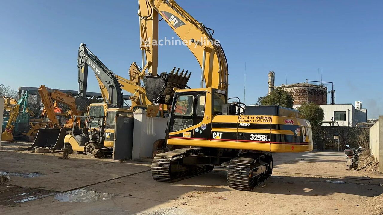 Caterpillar 325BL bager guseničar