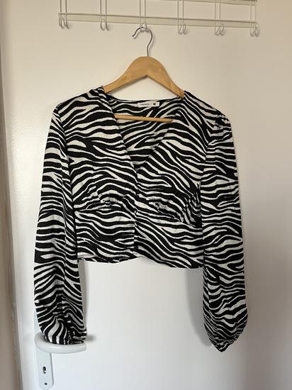 Zebrasti top