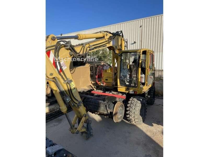 Atlas 1404 ZW bager na šinama