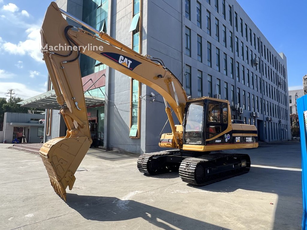 Caterpillar 320BL bager guseničar