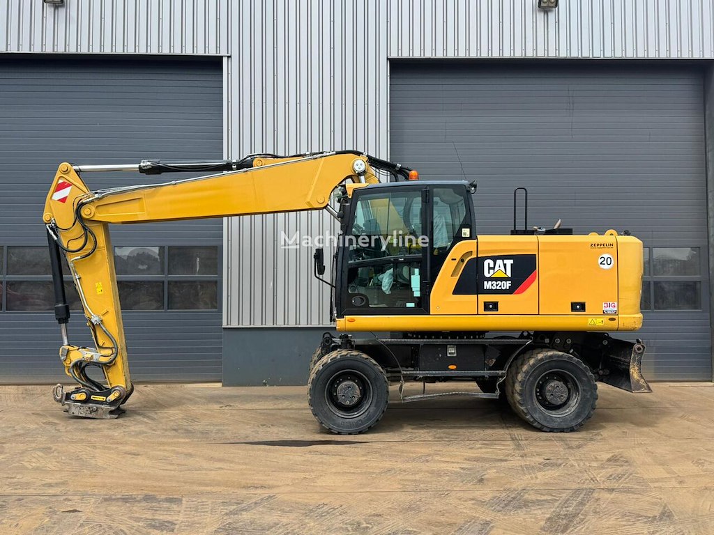 Caterpillar M320F bager točkaš