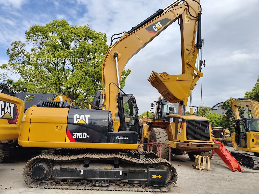 Caterpillar 315D2 bager guseničar