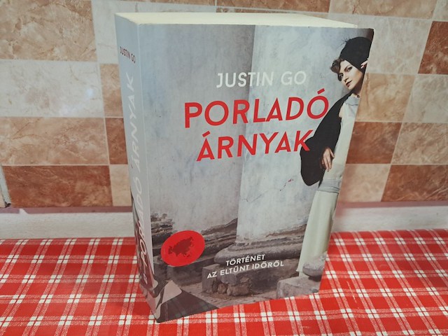 Justin Go Porladó árnyak