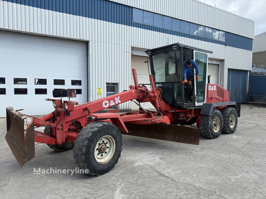 O&K F106 grejder