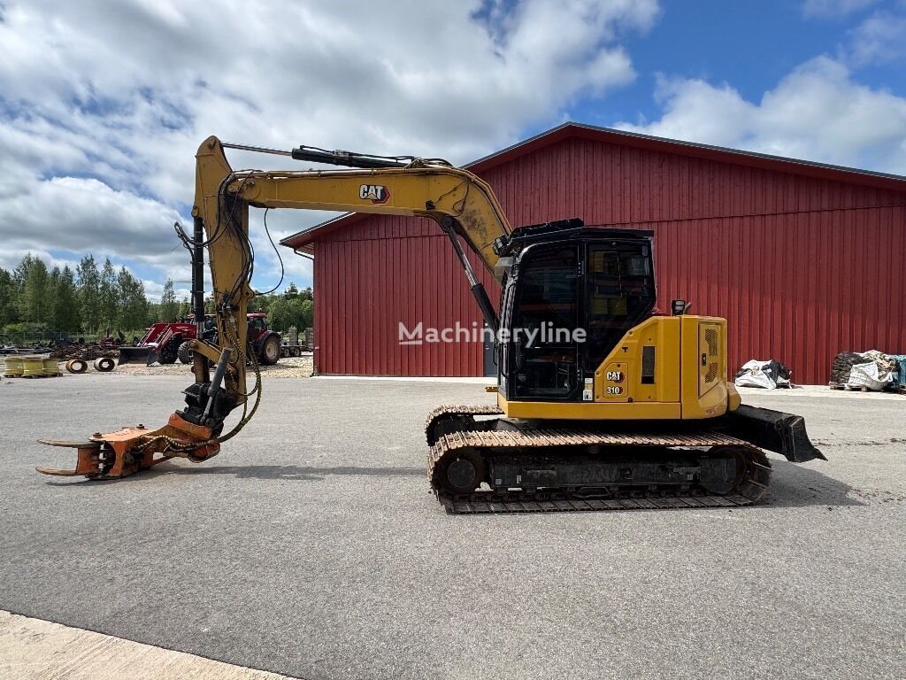 Caterpillar 310-07 midi bager