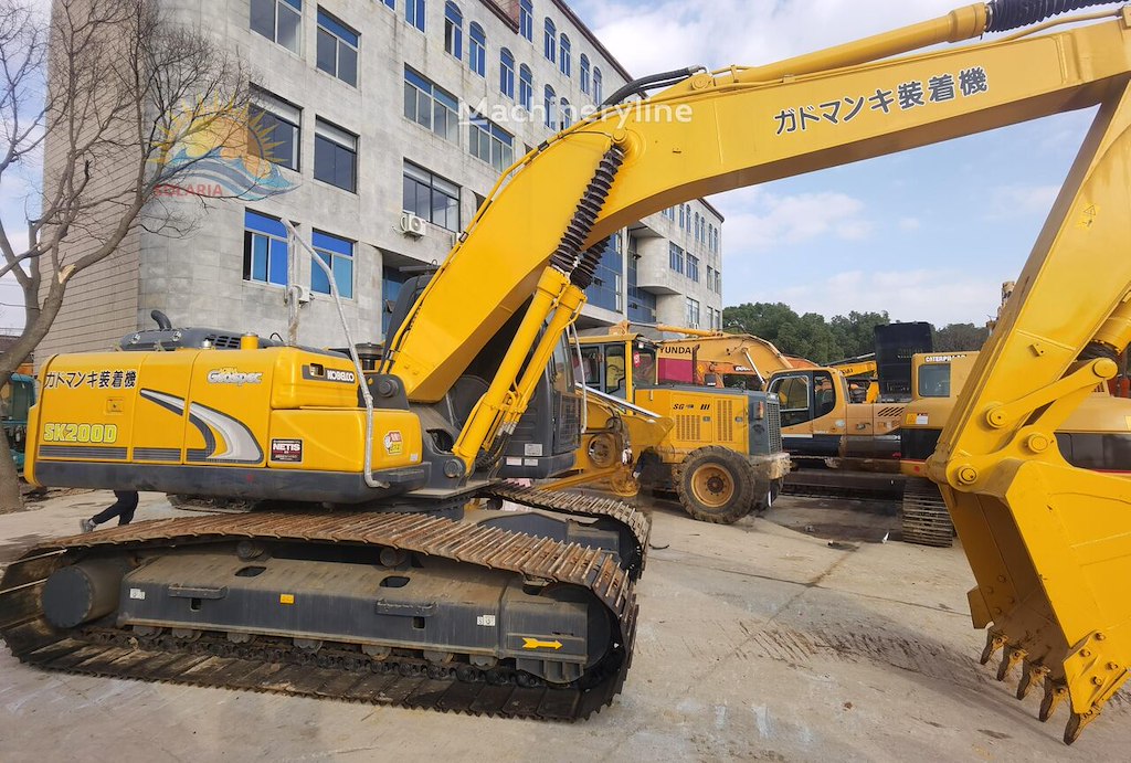 Kobelco SK200 bager guseničar