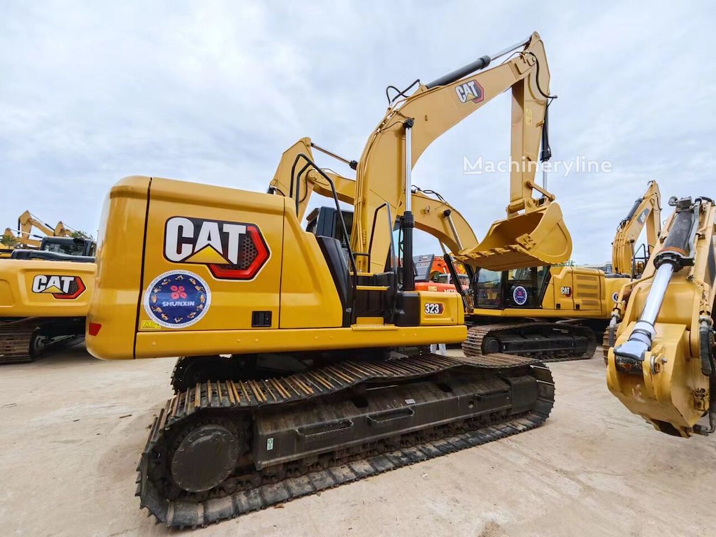 Caterpillar 323 bager guseničar