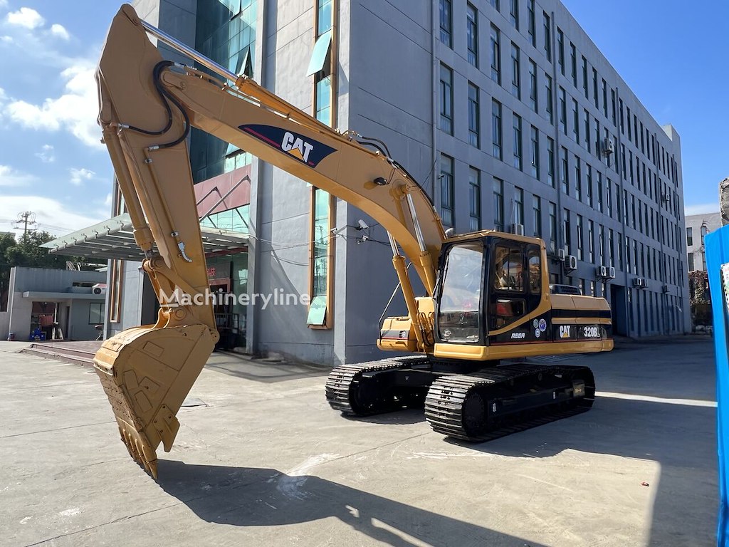 Caterpillar 320BL bager guseničar