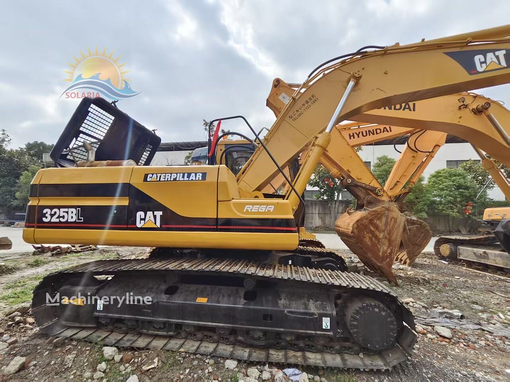 Caterpillar 325BL bager guseničar