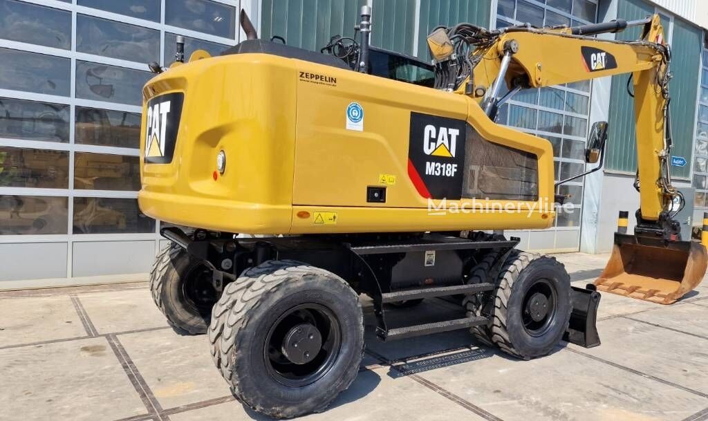 Caterpillar M 318 F, 2019 YEAR bager točkaš