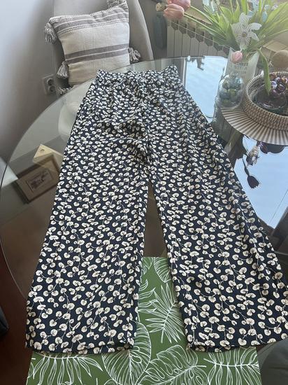 GANNI cvetne pantalone