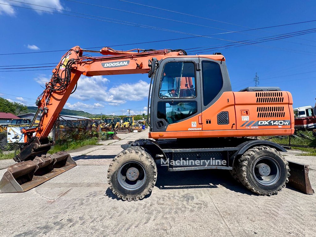 Doosan DX140 W-3 bager točkaš