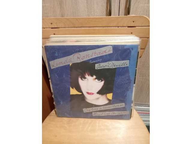 Linda Ronstadt featuring Aaron Neville – Cry Like A Rai