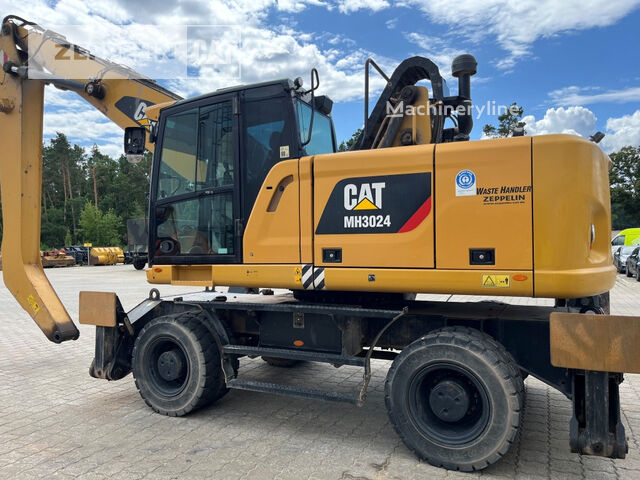 Caterpillar MH3024-06C bager za pretovar