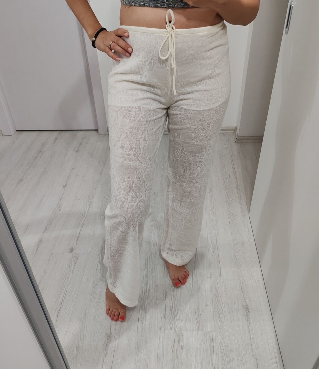 Bele letnje cipkane pantalone od Lana (70%) Velicina M ZARA