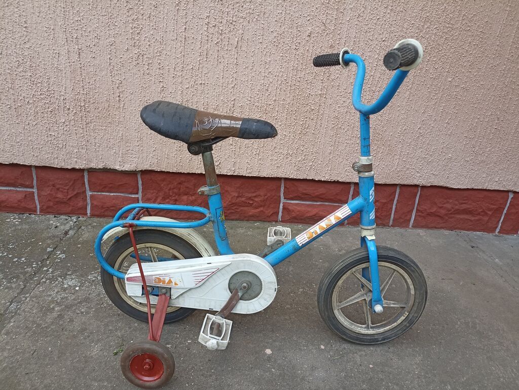 Dečije bicikla sa slike,u voznom stanju,sa pomoćnim točkićima, za