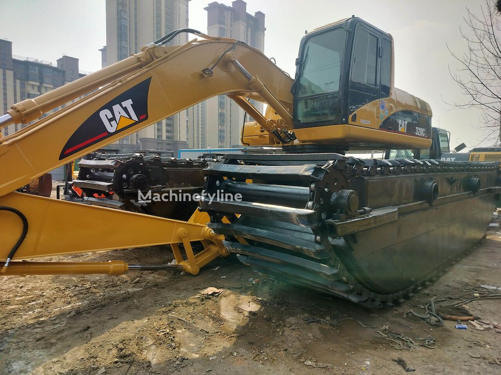 Caterpillar 320CL bager amfibija