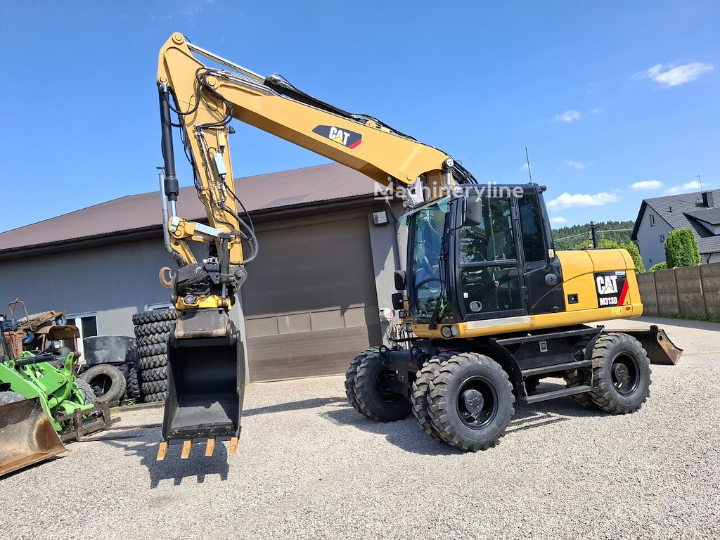 Caterpillar M313D bager točkaš
