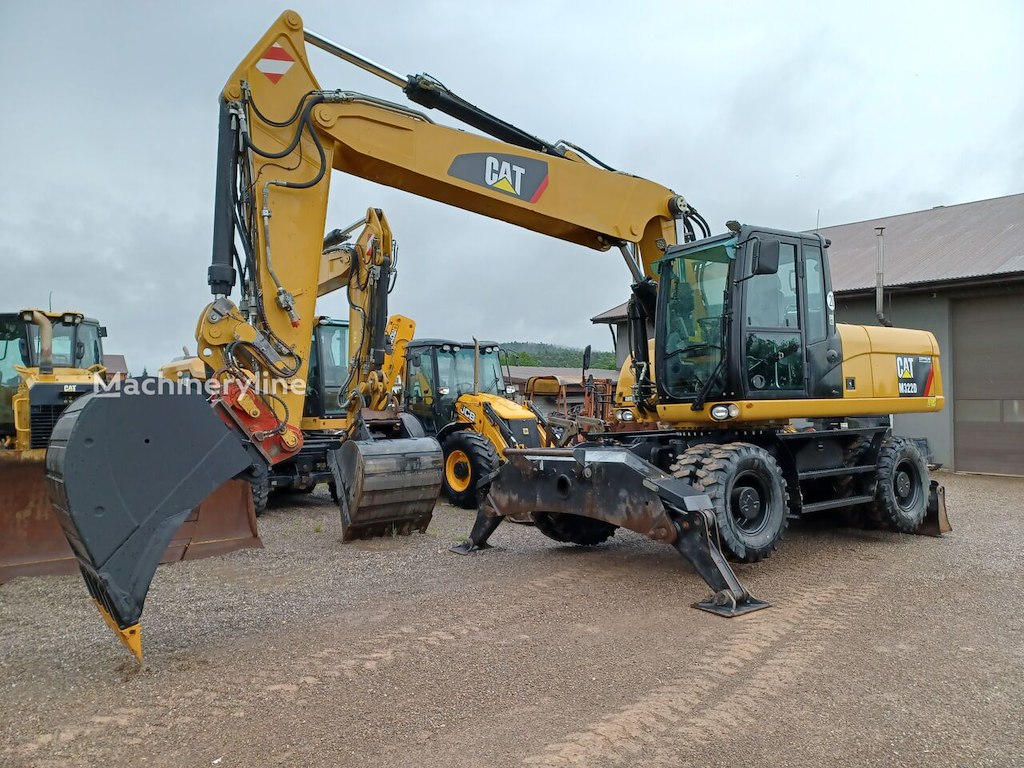 Caterpillar M322 bager točkaš