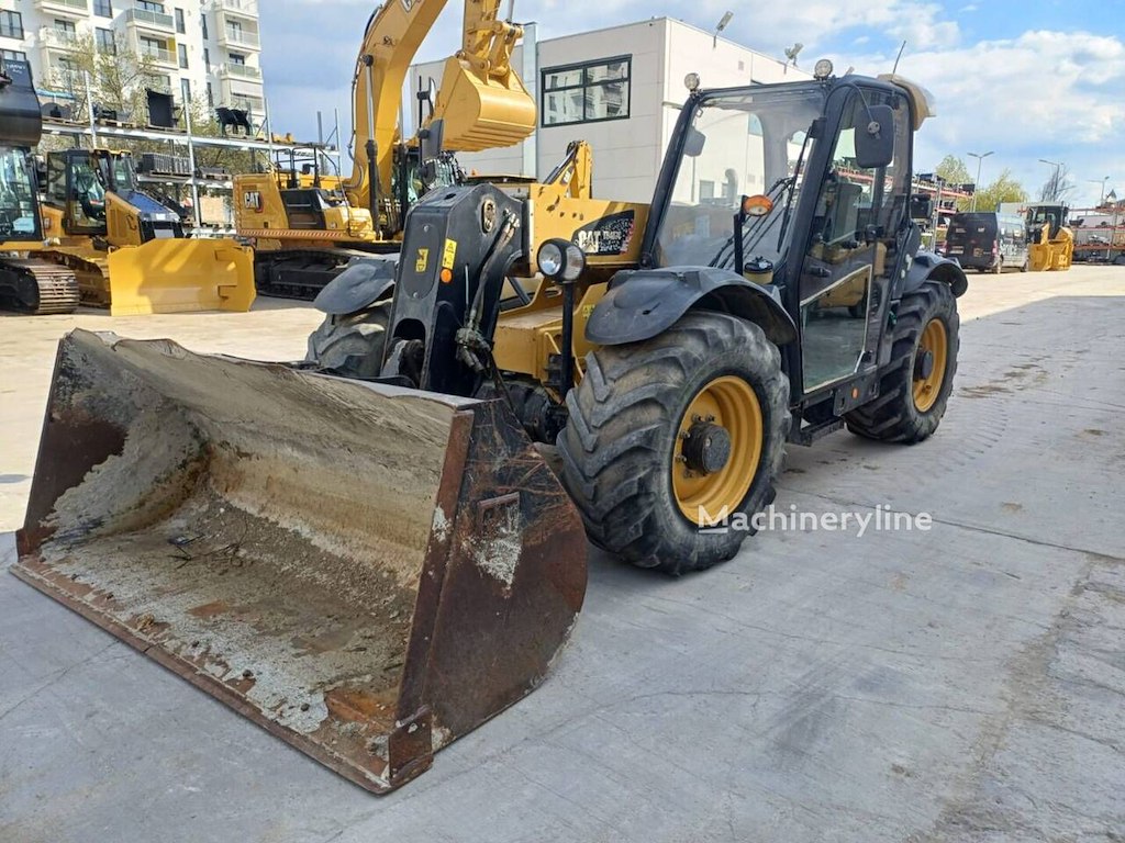 Caterpillar TH407C teleskopski utovarivač