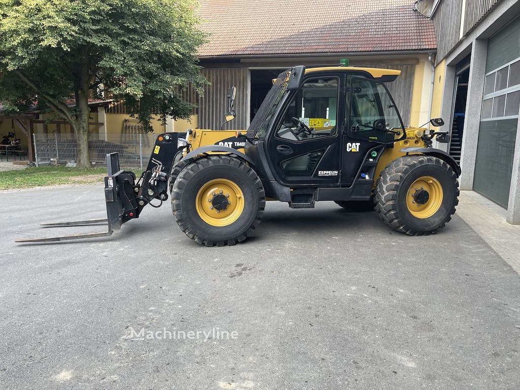 Caterpillar TH408D teleskopski utovarivač