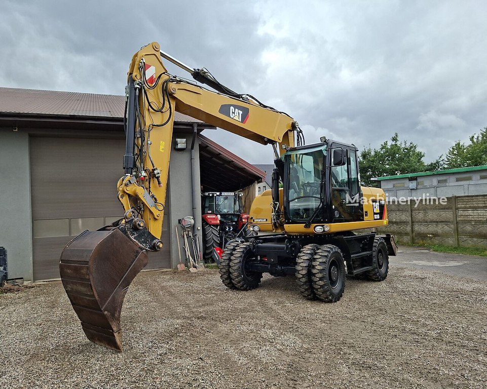 Caterpillar 315D bager točkaš