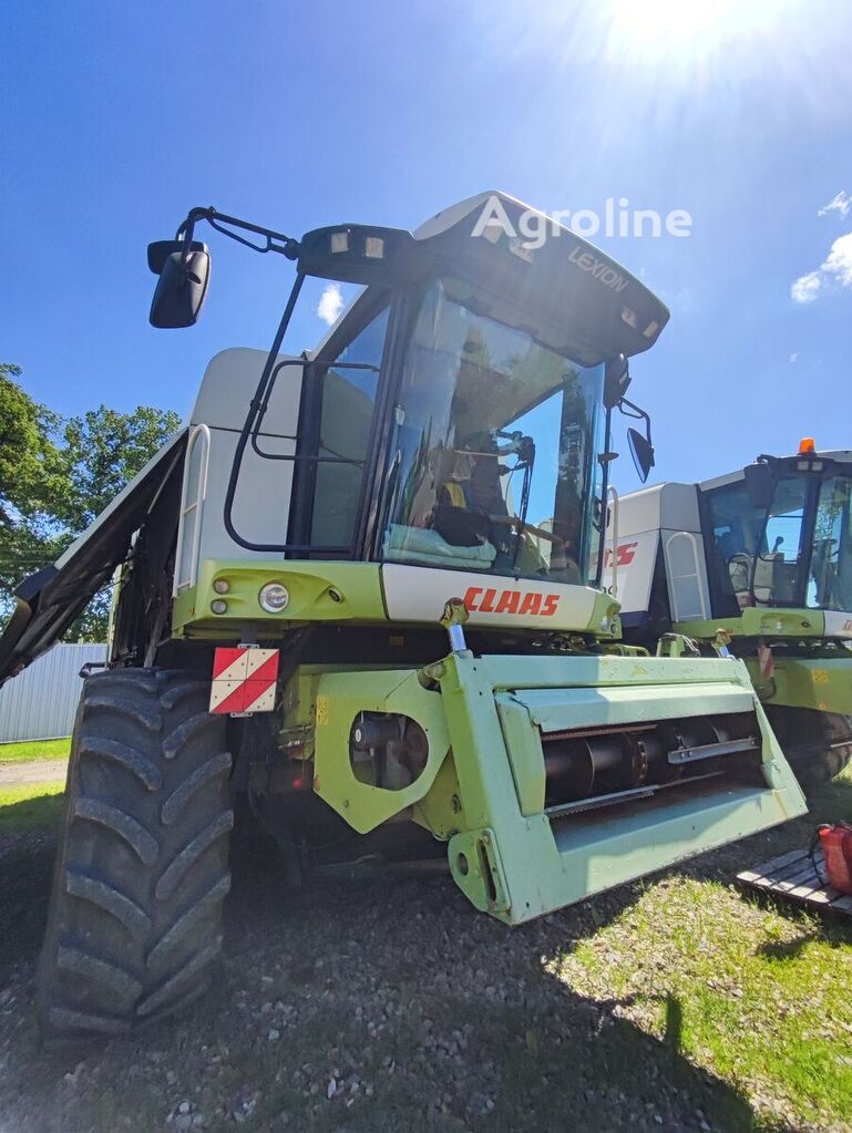 Claas Lexion 560 zi zhnyvarkoiu Vario 750 ta vizkom kombajn za žito