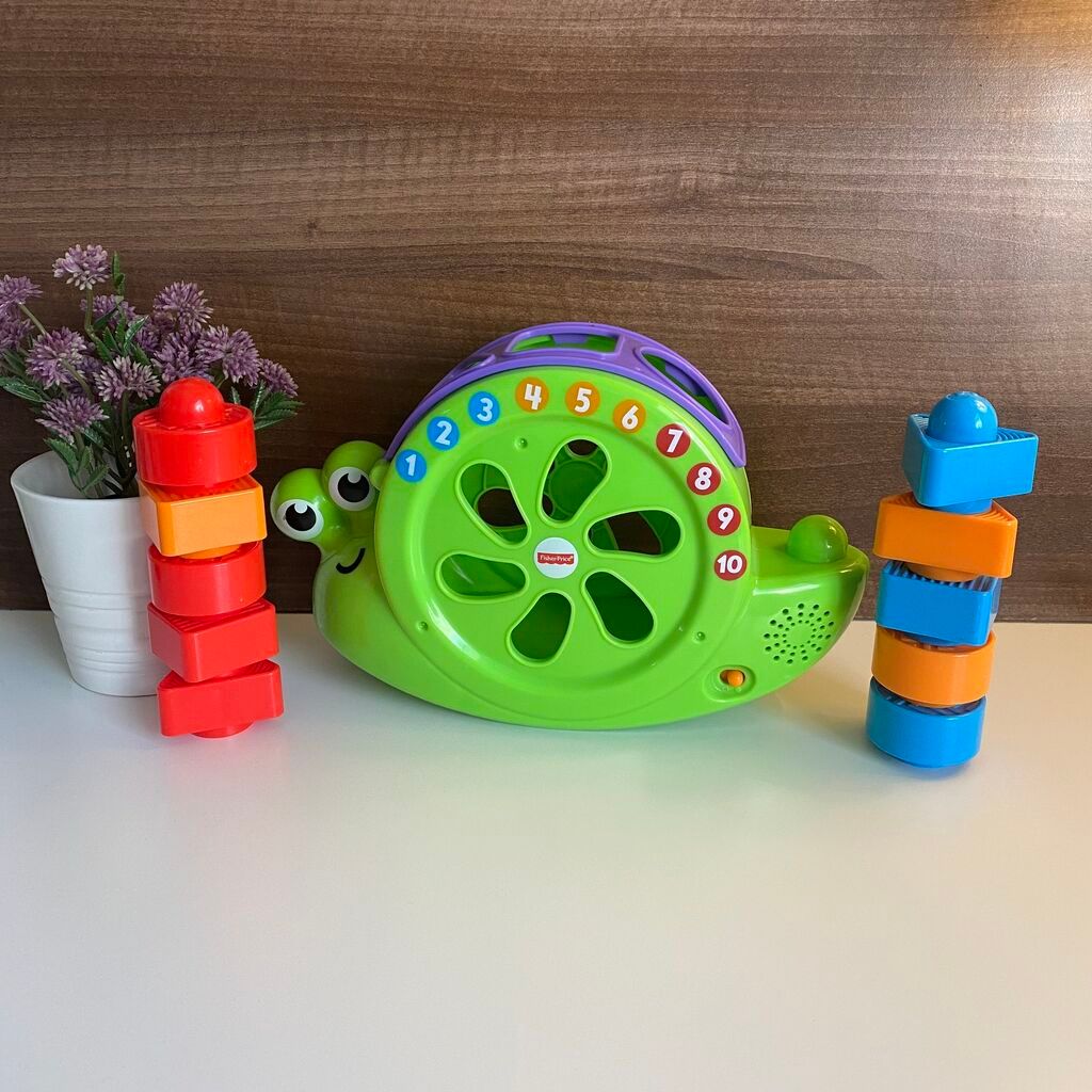 Fisher Price muzicki interaktivni puz sa kockama razlicitog oblika
