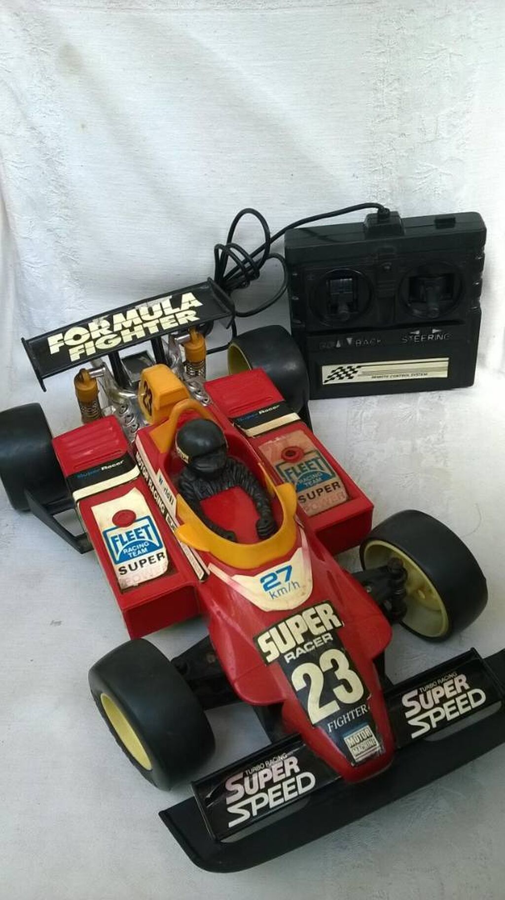 Na daljinski auto Formula 1:18(33 cm.) na kabl, ispravan, levo desno i