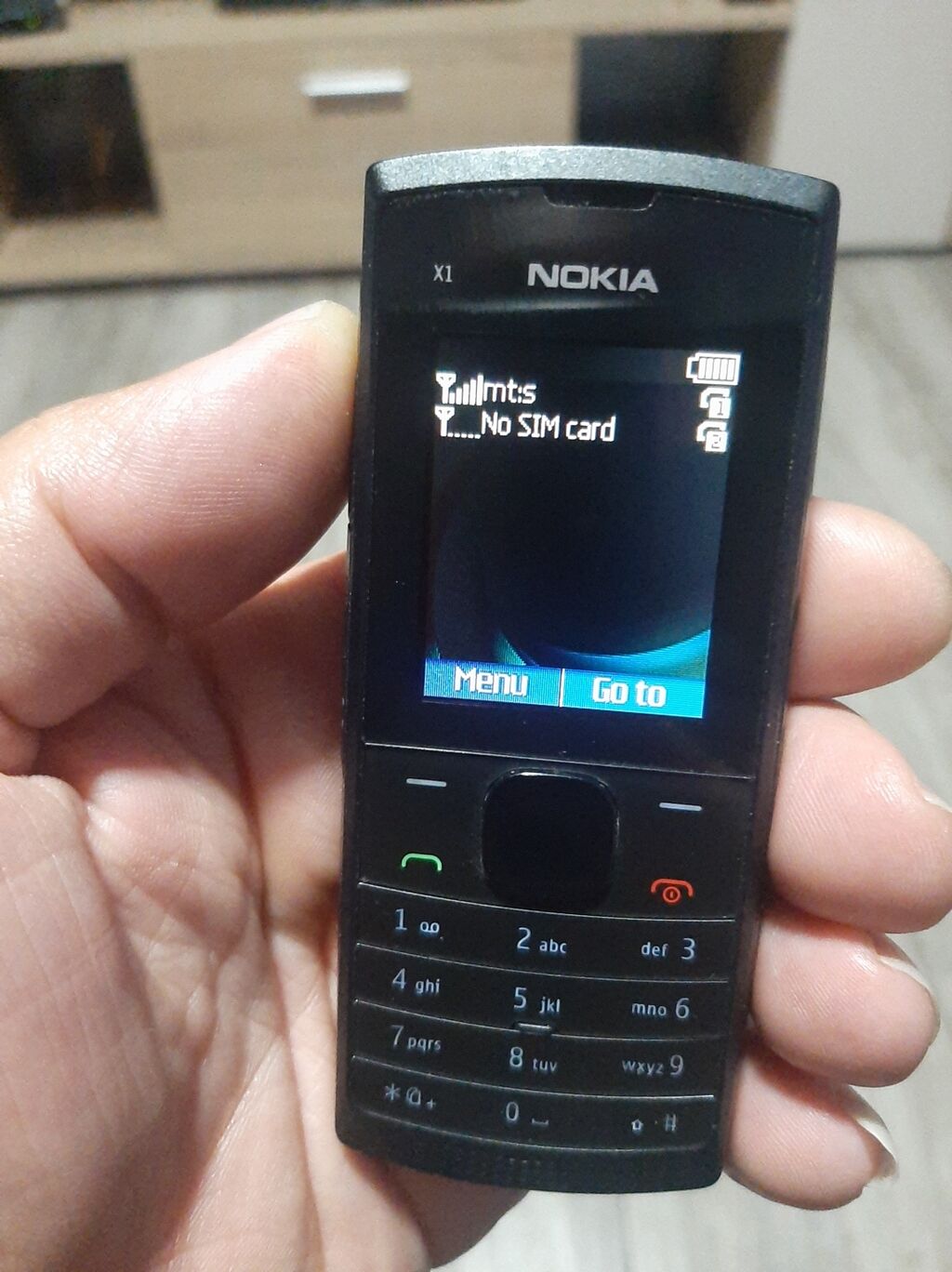 Nokija x1 sa dve kartice kao nova radi na sve mreze,baterija