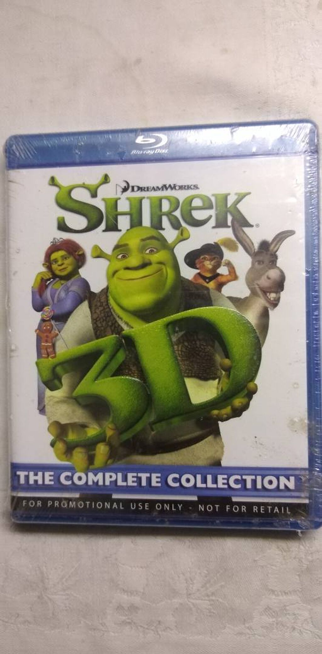 Blu-ray disc 3D,4 filma o Shrek-u,traje 93 min. na 10 stranih