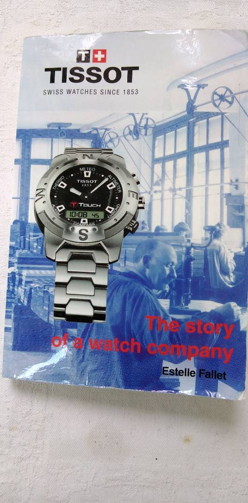 Knjiga:The Story of a watch company(Prica o Tissot fabrici) mini