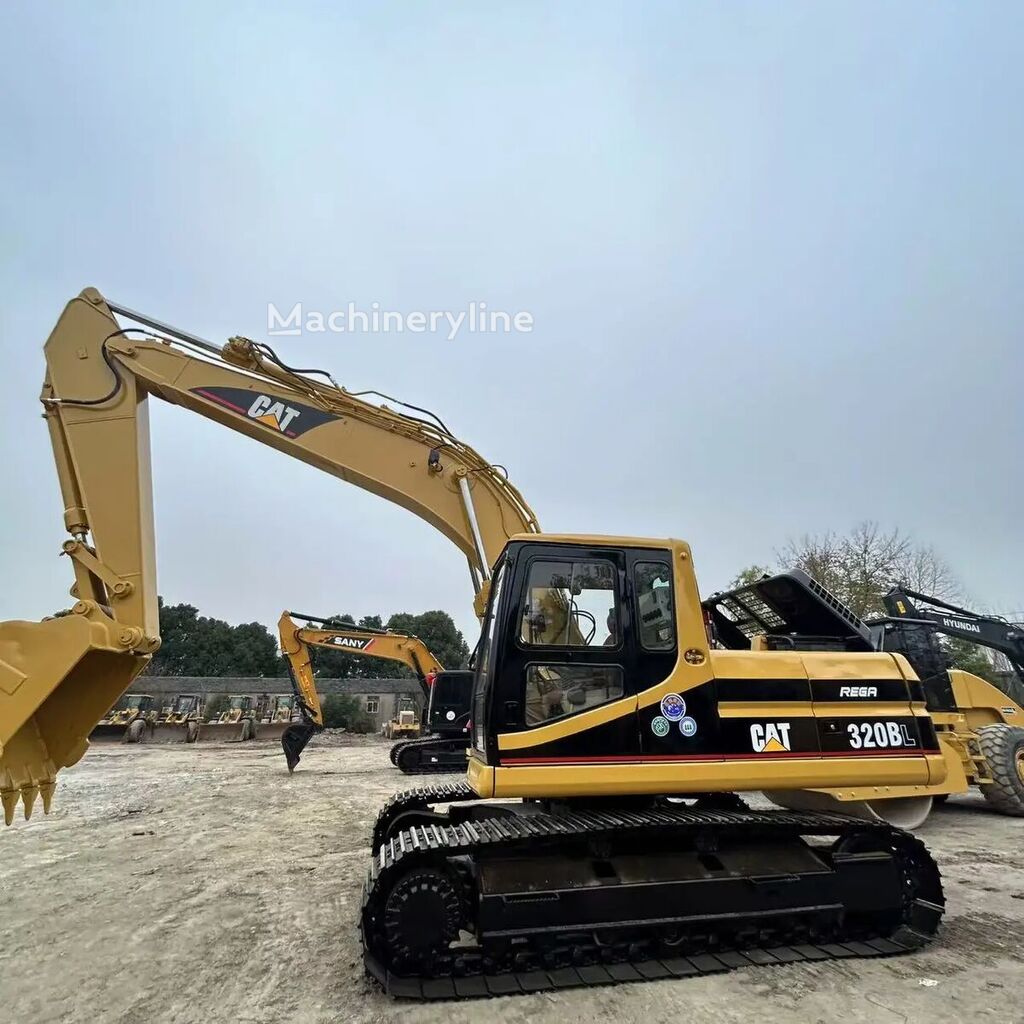 Caterpillar 320BL bager guseničar