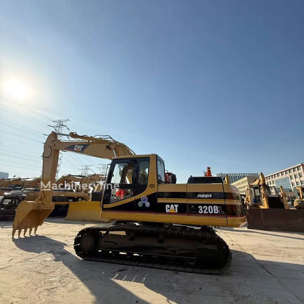 Caterpillar 320BL bager guseničar